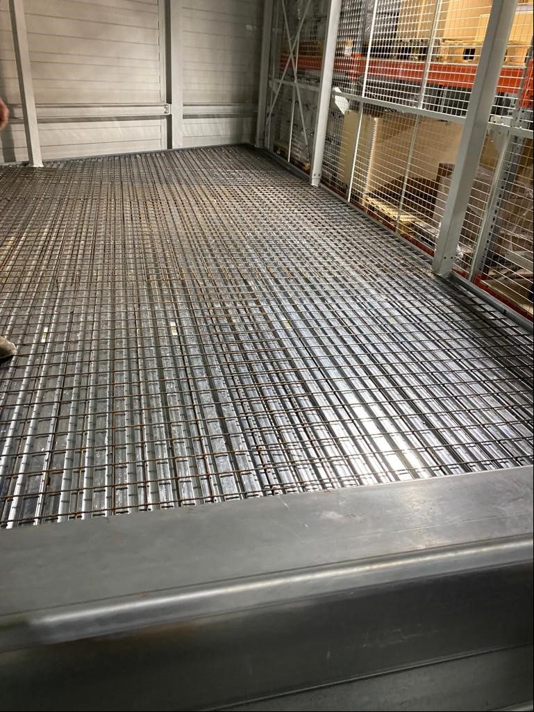 Robotics on a mezzanine floor: work with concrete! | Almacon